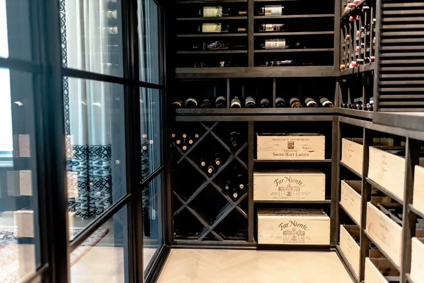 Custom_wine_cellar_with_black_modern_wine_racking_and_case_storage ...