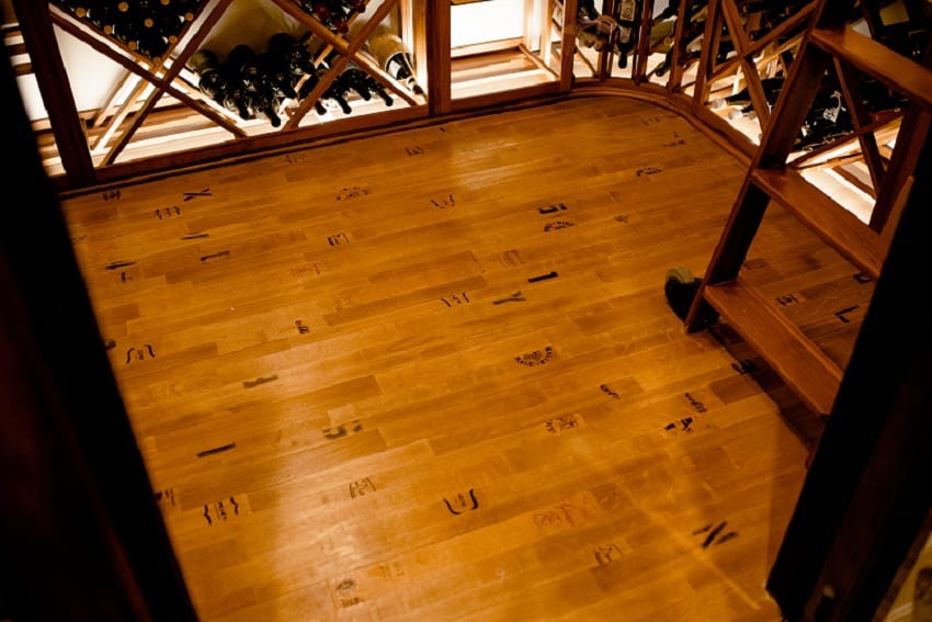 Transitional Wine Cellar and Bar Area in North Dallas Home