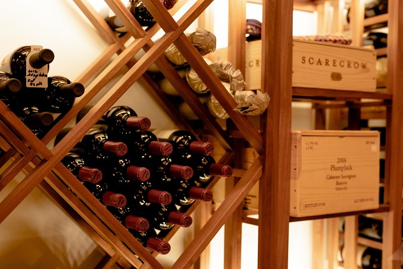 Transitional Wine Cellar and Bar Area in North Dallas Home